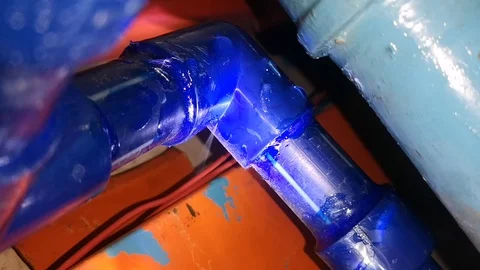 1-inch ABS pipe type leaks on the L-bow.... | Stock Video | Pond5