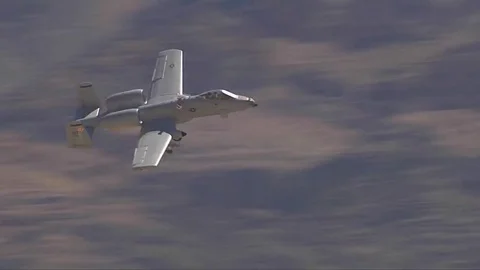 A-10 jet fighter aircraft fire guns and ... | Stock Video | Pond5