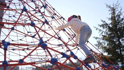 15 Rope web climbing and crawling little... | Stock Video | Pond5
