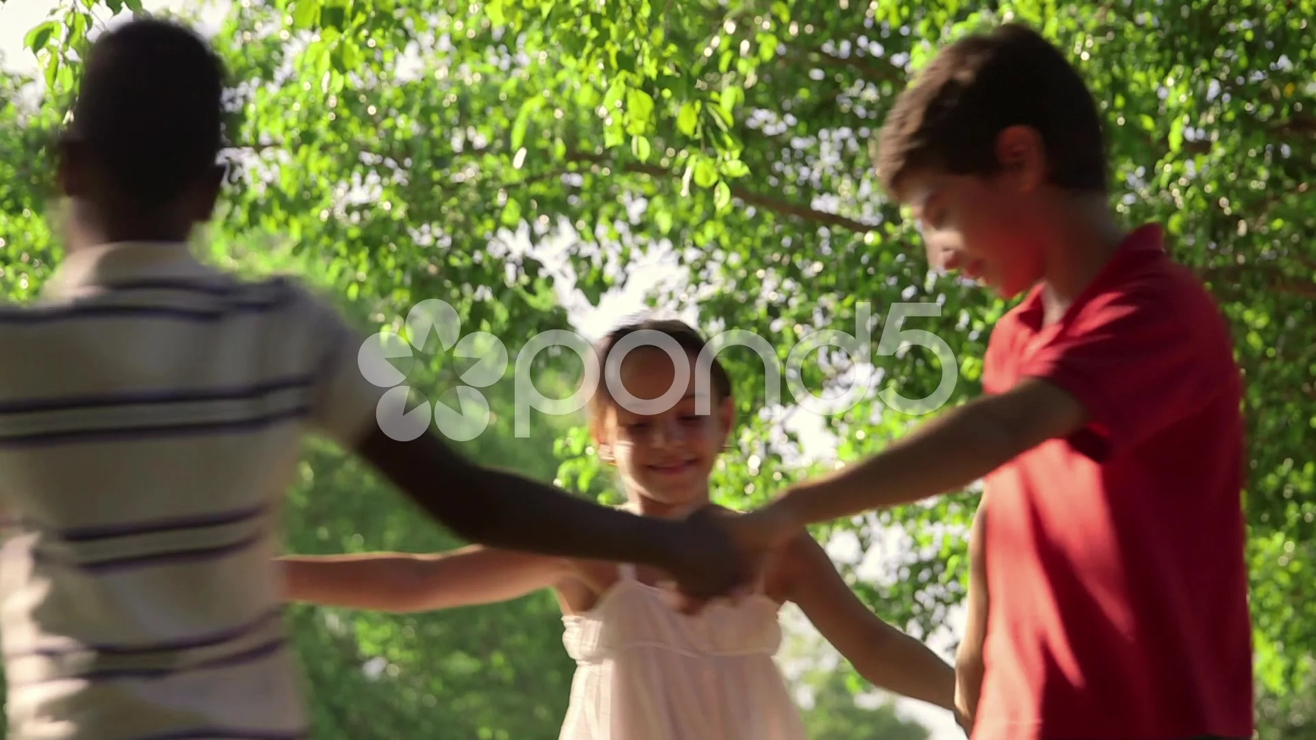 Kids Playing Ring Around The Rosie