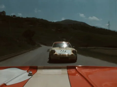 16MM - race car Porsche 911 on the road ... | Stock Video | Pond5
