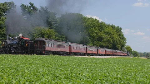A 1910 Steam Engine with Passenger Train... | Stock Video | Pond5