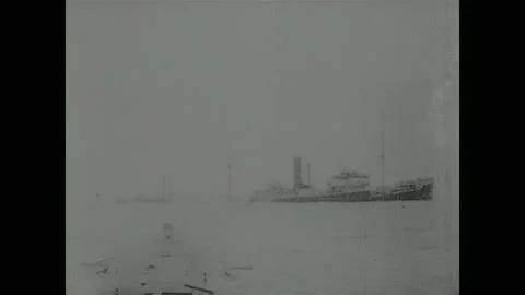 1910s: Cargo ship slowly sinks into ocea... | Stock Video | Pond5