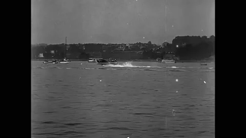 1910s: Motorboats speed on Detroit River... | Stock Video | Pond5