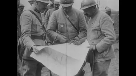 1916 - French officers go over a map by ... | Stock Video | Pond5