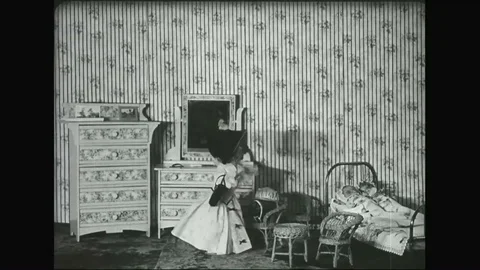 1920 - In this stop-motion sequence, dol... | Stock Video | Pond5