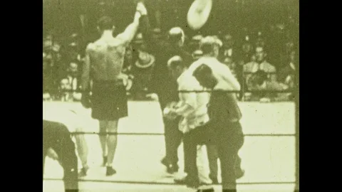 1920s: Boxing ring, man raises winner's ... | Stock Video | Pond5