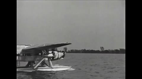 1920s - A Ford Tri-Motor seaplane floats... | Stock Video | Pond5
