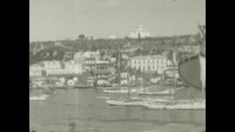 1920s: UNITED STATES: boat arrives in po... | Stock Video | Pond5