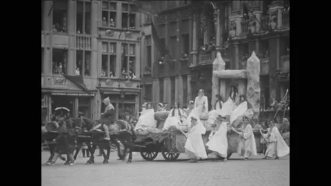 1930 - Floats in a French parade have a ... | Stock Video | Pond5