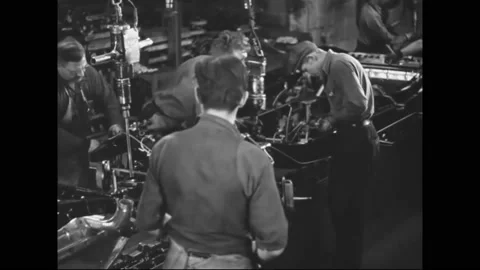 1930s - Car factory employees work on ch... | Stock Video | Pond5