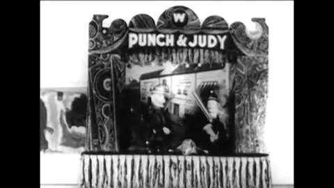 1930s Children watch a Punch and Judy pu... | Stock Video | Pond5