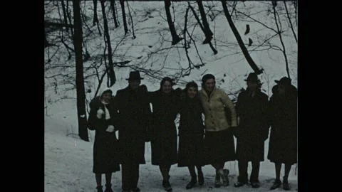 1930s: Group of people pose in a snowy w... | Stock Video | Pond5