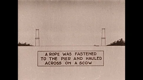 1930s: Intertitle card describes bridge ... | Stock Video | Pond5