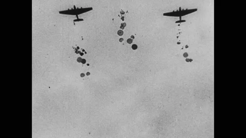 1930s: Intertitle card. Paratroopers jum... | Stock Video | Pond5