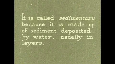 1930s: Intertitle card. Rock cliff and r... | Stock Video | Pond5