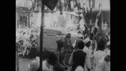 1930s - Mahatma Gandhi sit on an elevate... | Stock Video | Pond5