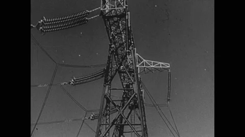 1930s: Power plant. Power lines. Farmer ... | Stock Video | Pond5