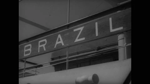 1930s - A US Navy ship sails a harbor in... | Stock Video | Pond5