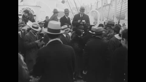 1933 - Reporters swarm Albert Einstein a... | Stock Video | Pond5