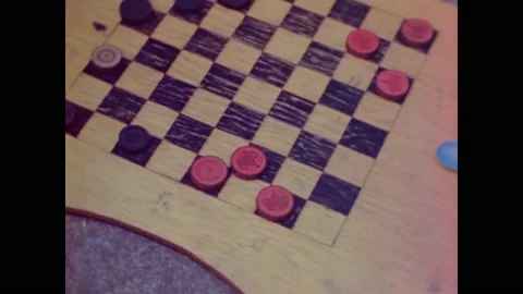 1940 - Black kids play checkers and Mono... | Stock Video | Pond5