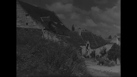 1940s: Barrel-built structure, woman car... | Stock Video | Pond5