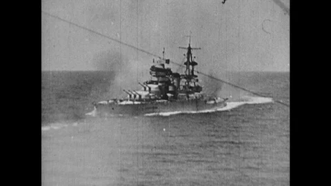 1940s: Battleship fires guns. Guns fire ... | Stock Video | Pond5