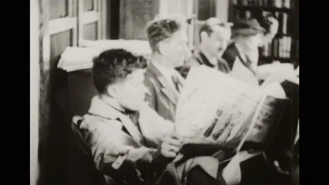 1940s: Boy reading, pan to wall. Shots o... | Stock Video | Pond5