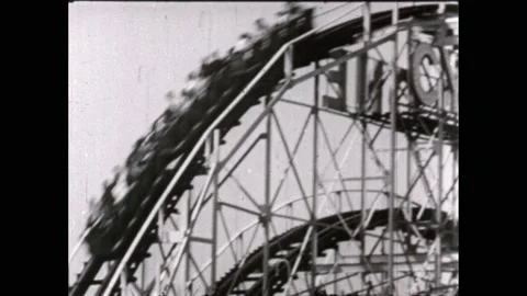 1940s: Cars on a wooden roller coaster g... | Stock Video | Pond5