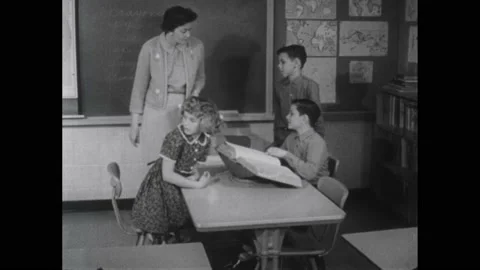1940s: Classroom. Teacher talks to stud... | Stock Video | Pond5