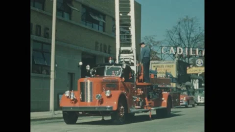 1940s: Fireman rotates the ladder on a f... | Stock Video | Pond5