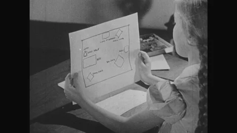 1940s: Hands hold piece of paper. sheet ... | Stock Video | Pond5