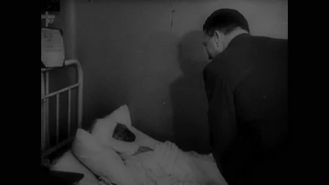 1940s: Hitler and officers visit wounded... | Stock Video | Pond5