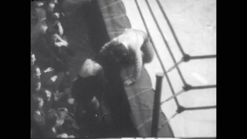 1940s: Lady wrestlers brawl in first row... | Stock Video | Pond5