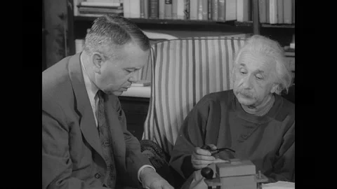 1940s: Man sits at table with Albert Ein... | Stock Video | Pond5