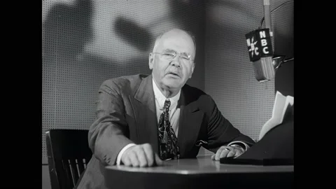1940s: Newscaster speaks in studio. Mee... | Stock Video | Pond5