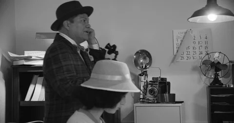 1940s newspaper reporter pacing while ta... | Stock Video | Pond5