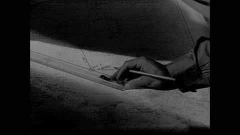 1940s: Officers plot naval course on map... | Stock Video | Pond5