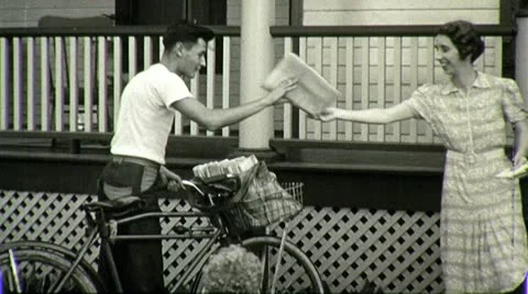 1940s PAPERBOY Man DELIVERS NEWSPAPER Wo... | Stock Video | Pond5