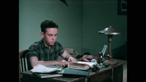 1940s: Person holds up film slate. Boy s... | Stock Video | Pond5