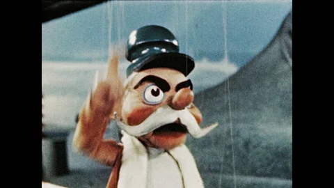 1940s: Puppet with moustache chides pupp... | Stock Video | Pond5