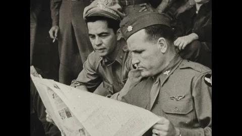 1940s: Soldiers reading newspaper. Soldi... | Stock Video | Pond5