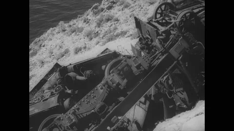 1940s - Steel wreckage on a beach in war... | Stock Video | Pond5