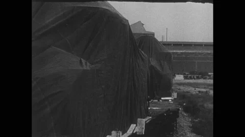 1940s: Tanks are transported on trailers... | Stock Video | Pond5