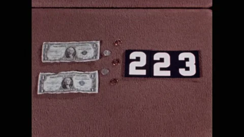 1940s: Two one dollar bills and coin cur... | Stock Video | Pond5