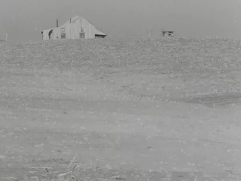 1940s: Wooden barn in barren landscape | Stock Video | Pond5
