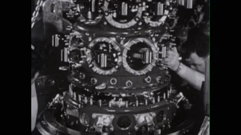 1940s: Workers assemble aircraft engines... | Stock Video | Pond5