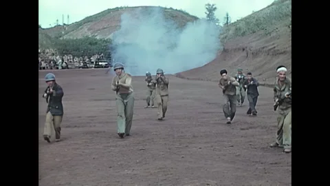 1942 US soldiers practice firing their w... | Stock Video | Pond5