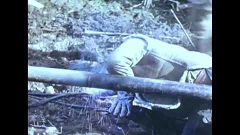 1943 - US Army engineers weld the Canol ... | Stock Video | Pond5
