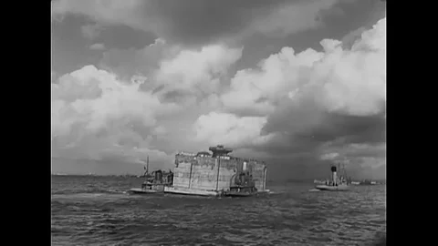 1944 - Aircrafts fly over US Coast Guard... | Stock Video | Pond5